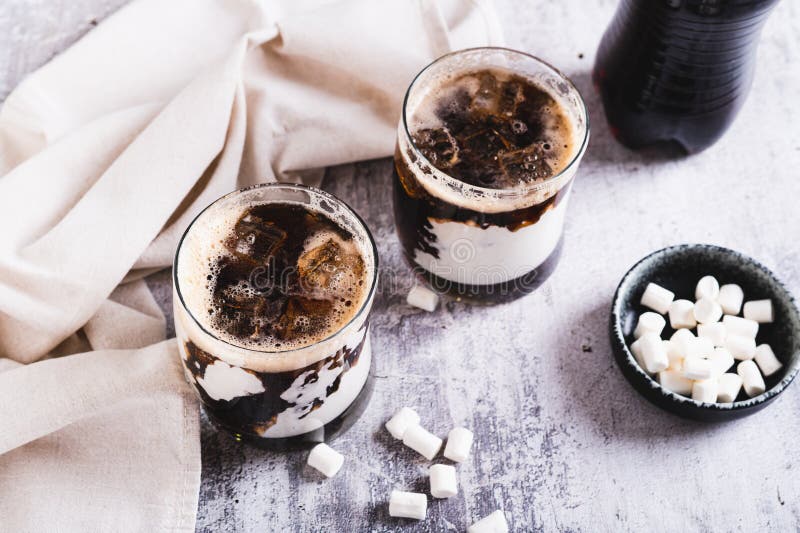 Trendy Fluffy Coke with Marshmallow in Glasses on the Table Stock Photo ...