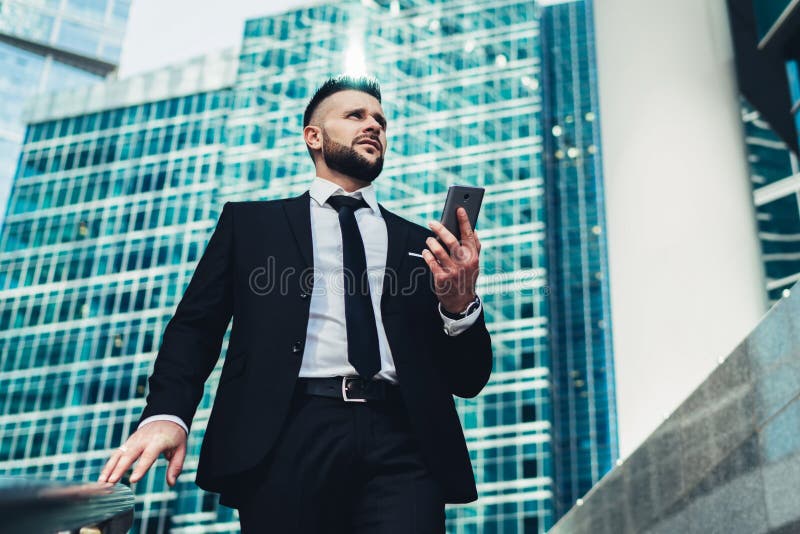 Trendy Formal Businessman in Suit Surfing Smartphone Stock Photo ...