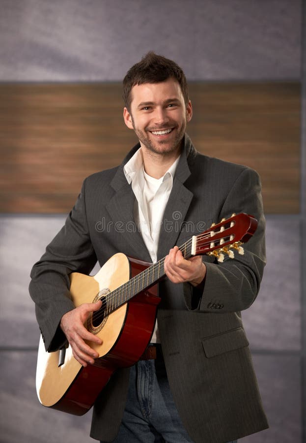 Trendy guy with guitar stock image. Image of enjoy, color - 23095979