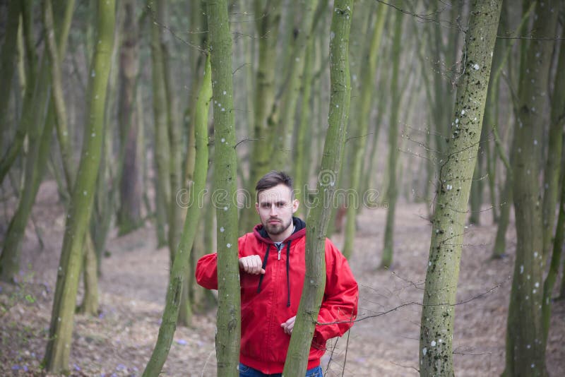 Trendy Handsome Man Posing in Spring Park Alone Stock Image - Image of ...