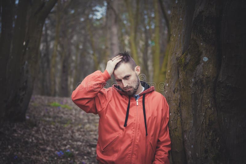Trendy Handsome Man Posing in Spring Park Alone Stock Image - Image of ...