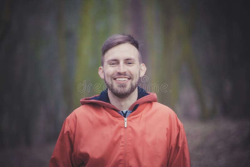 Trendy Handsome Man Posing in Spring Park Alone Stock Image - Image of ...
