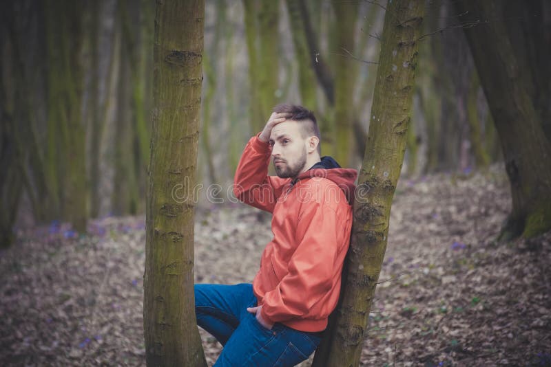 Trendy Handsome Man Posing in Spring Park Alone Stock Image - Image of ...