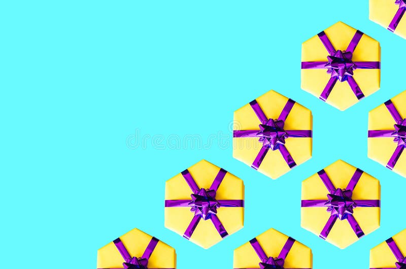 Pattern of Yellow Gift Boxes on a Gray Background Stock Photo - Image ...