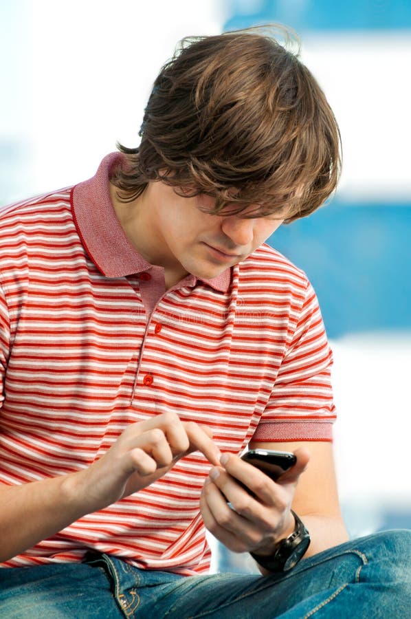Trendy Young Guy Typing a Message on Mobile Stock Image - Image of ...