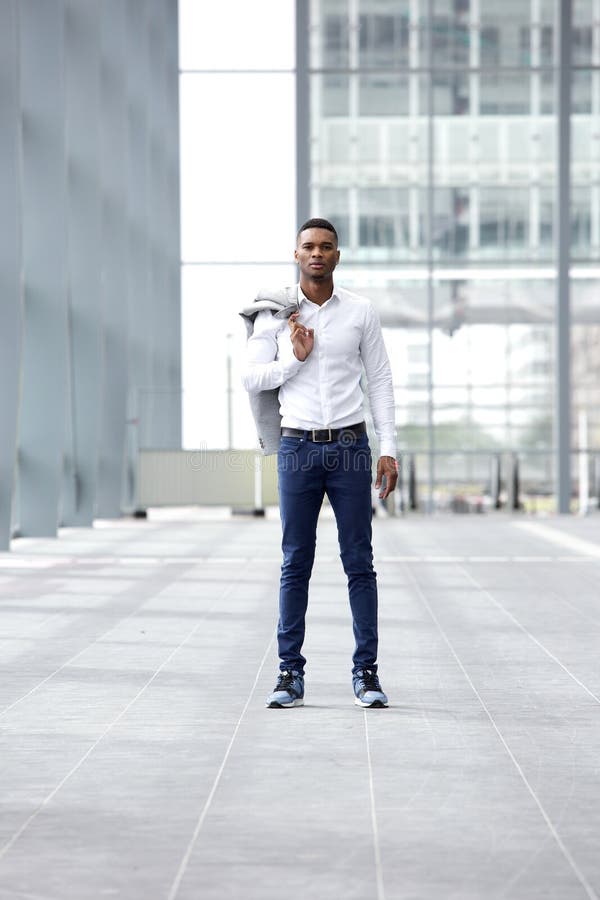 Trendy Young Man Standing in Building Alone Stock Photo - Image of full ...