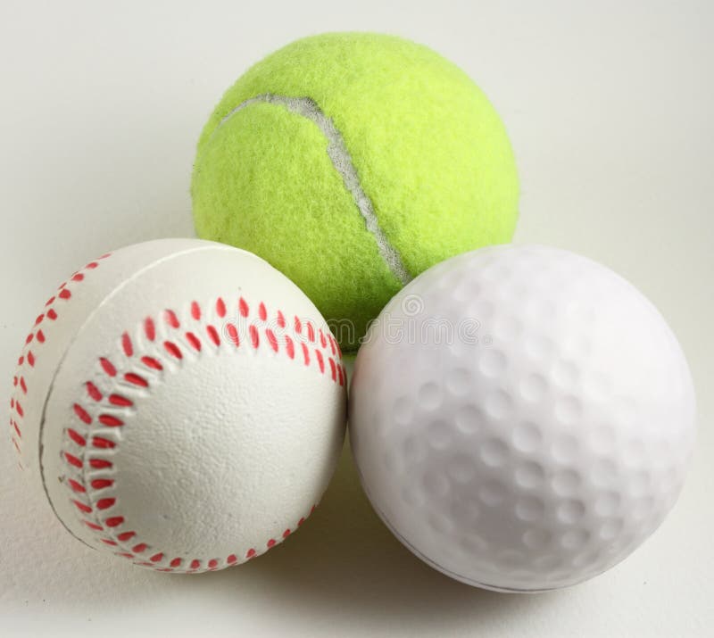Tres bolas de los deportes imagen de archivo. Imagen de béisbol - 18201559