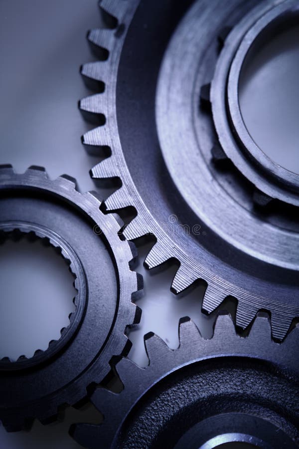 Engranajes De La Potencia En La Acción Imagen de archivo - Imagen de ...