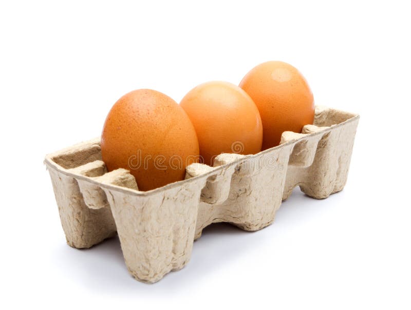 Tres huevos en el conjunto foto de archivo. Imagen de lleve - 26192702