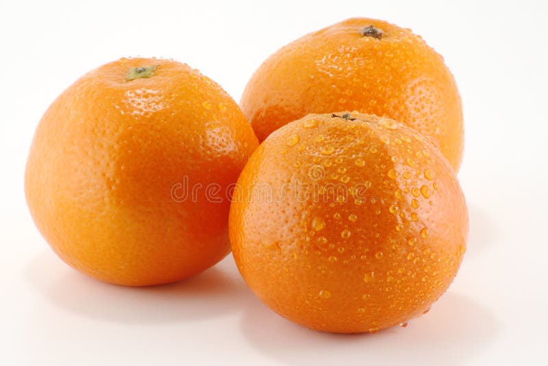 Tres naranjas maduras imagen de archivo. Imagen de piel - 42833485