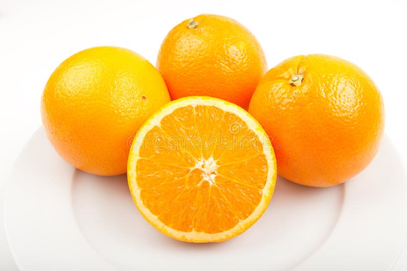 Tres Naranjas Maduras En Blanco Foto de archivo - Imagen de verano ...