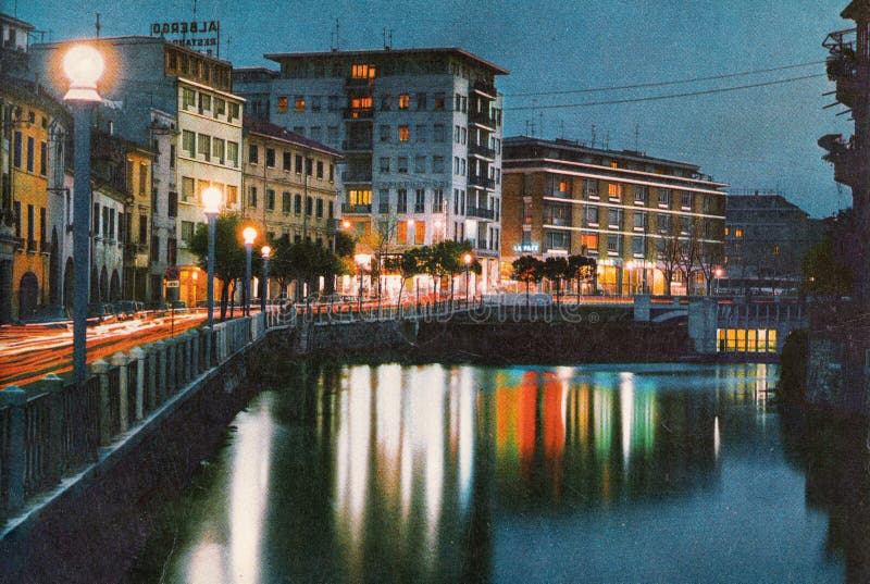 By night in Treviso, Italy editorial stock image. Image of tables ...