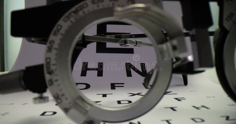 Trial Frame Test for Eye Chart and Glasses on White Table Stock Video ...