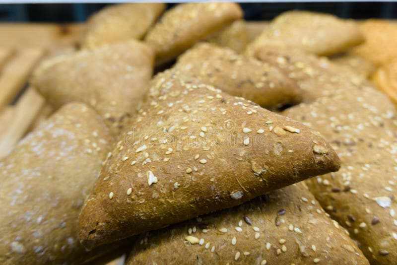 Triangle Bread with Sunflowers Seeds and Broken Flax Seeds Stock Image ...