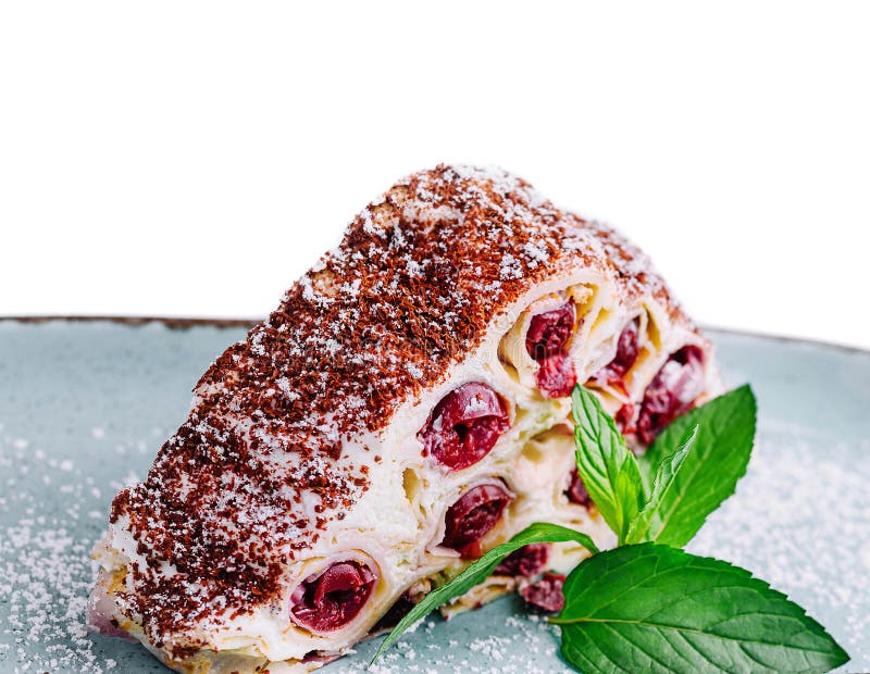 Triangle Cherry Cake with Cream and Chocolate Sprinkles Stock Photo ...
