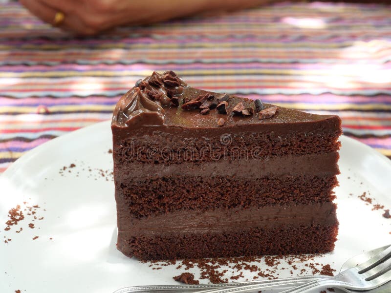 Triangle Chocolate Cake in Dish on Table Stock Photo - Image of baked ...