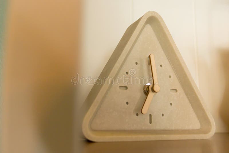 Triangle Clock at Seven O`clock. Stock Image - Image of modern ...