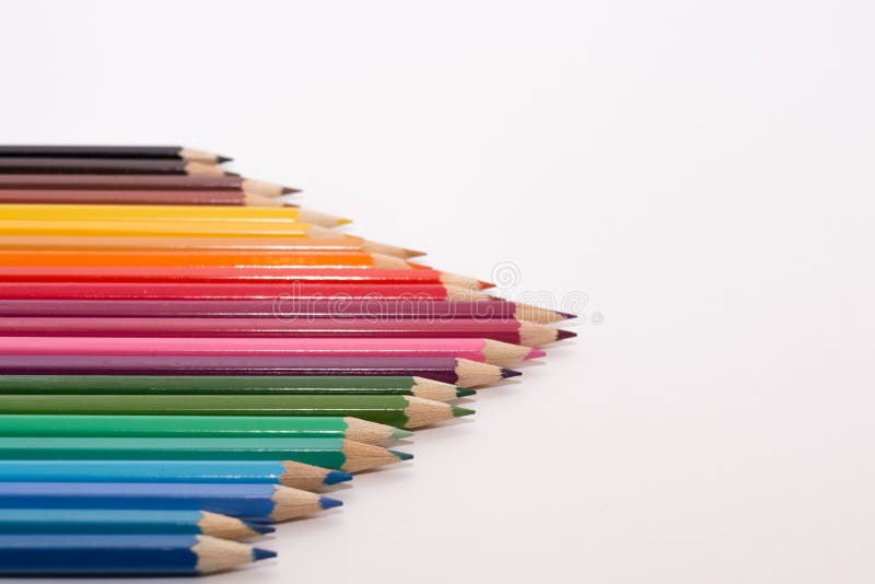 Triangle of Colored Pencils Stock Image - Image of colorful, green ...