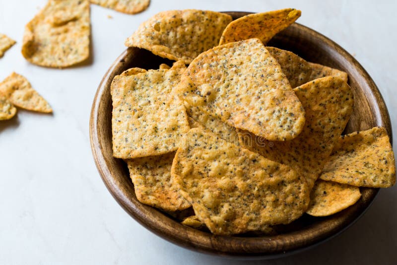 Triangle Corn Chips with Poppy Seeds Stock Image - Image of snack ...