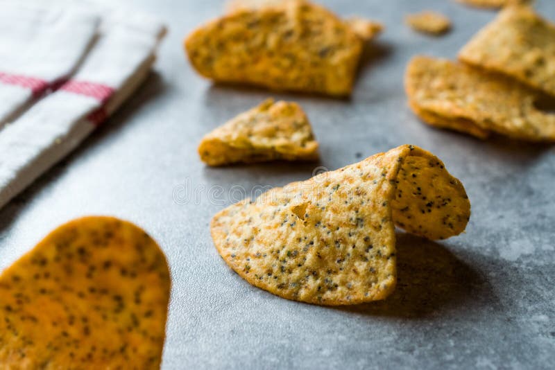 Triangle Corn Chips with Poppy Seeds Stock Image - Image of chips ...
