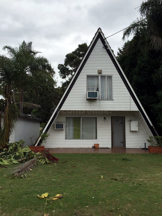 The triangle house stock photo. Image of estate, shape - 85650488