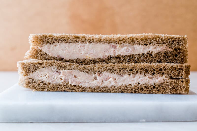 Triangle Light Sandwich with Tuna Fish Paste on Marble Board Stock ...