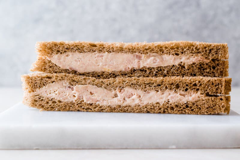 Triangle Light Sandwich with Tuna Fish Paste on Marble Board Stock ...