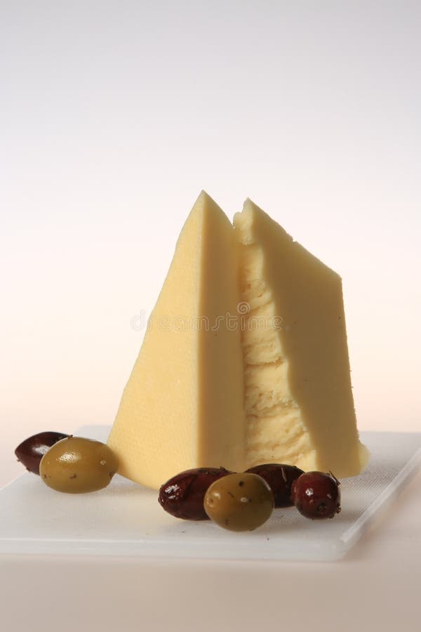 Triangle Pieces of Cheese Next To Each Other Stock Photo - Image of ...