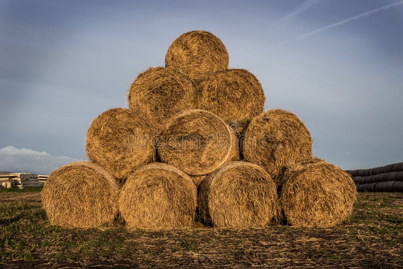 Triangle Pyramid from Pressed Bales of Straw Reels Stock Photo - Image ...