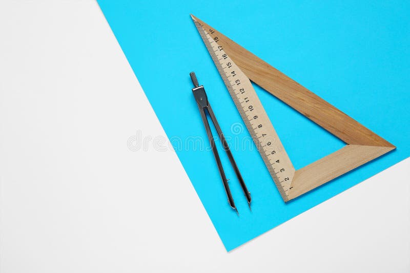 Triangle Ruler, Paper Sheet and Compass on White Background, Flat Lay ...