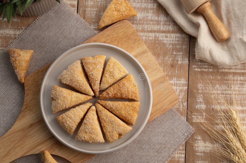 Triangle Shape Butter Crispy Pie,Sugar Crisp Pie in White Plate. Stock ...