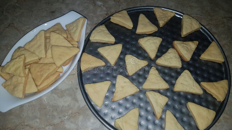 Triangle Shaped Biscuits Cookies in Plate Ready To Bake Food ...