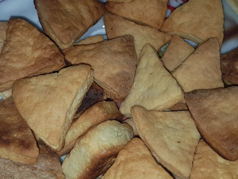 Triangle Shaped Biscuits Cookies in Plate Ready To Bake Food ...