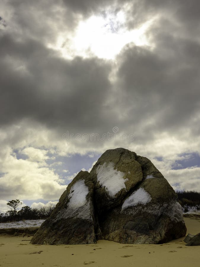 Triangle Shaped Giant Glacial Rock Covered with Snow on Cloudy Beach ...