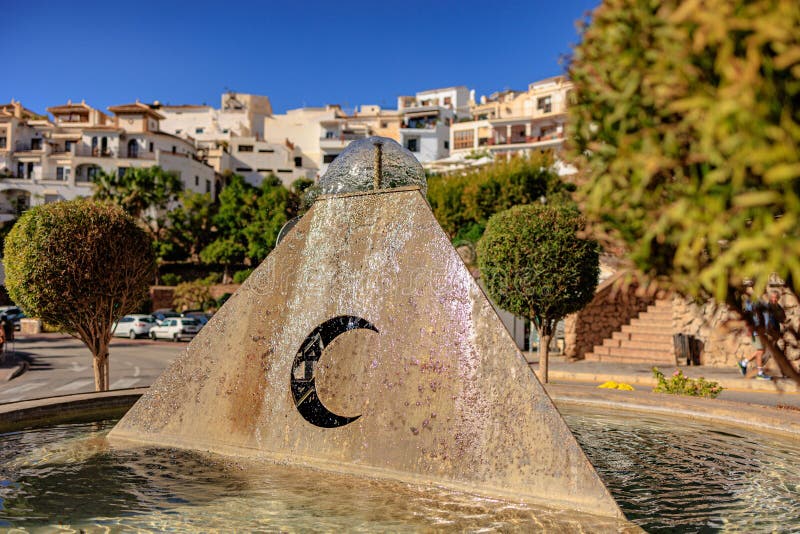 Triangle Statue with Black Moon Sign in the Park in Malaga, Spain ...