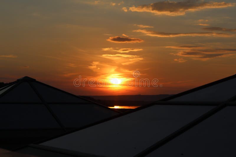 Triangle sunset stock photo. Image of triangle, cloud - 253411498