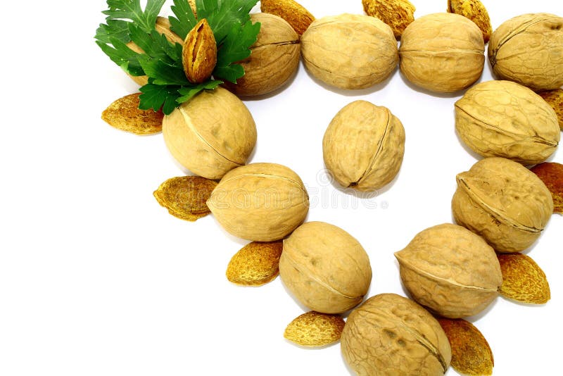 Triangle of Two Types of Nuts: Walnuts and Almonds on a White ...