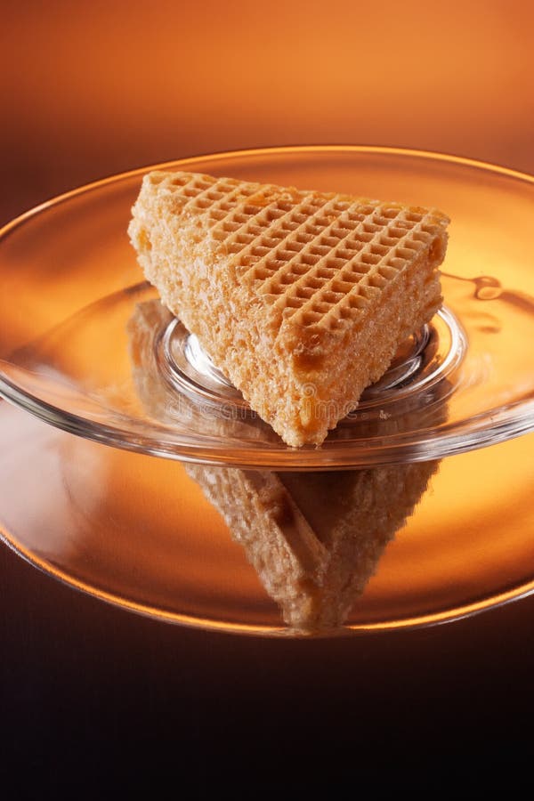 Triangle Wafer Cookie on Glass Plate Stock Image - Image of closeup ...