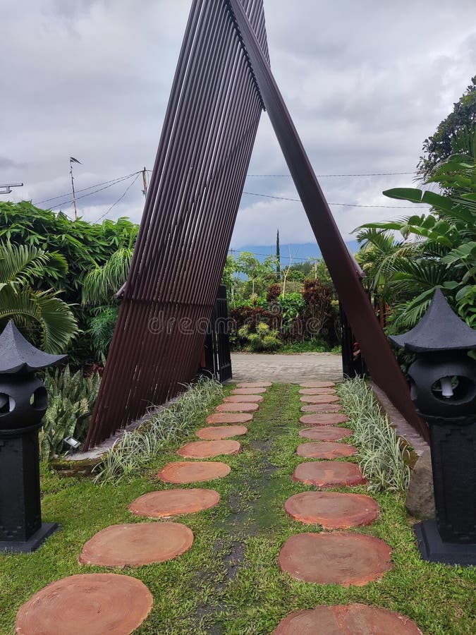 Triangle Wood Gate and Stepping Stone Stock Photo - Image of wood ...