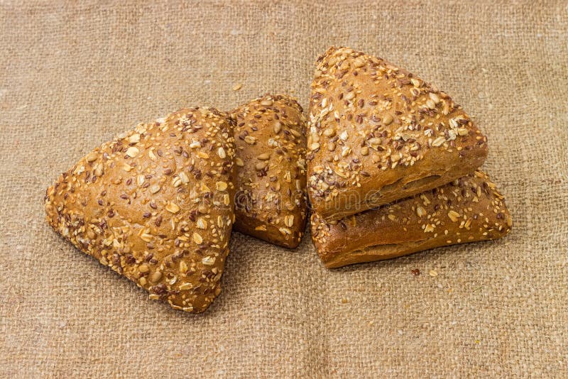 Triangular Breads Sprinkled with Different Seeds on a Sackcloth Stock ...