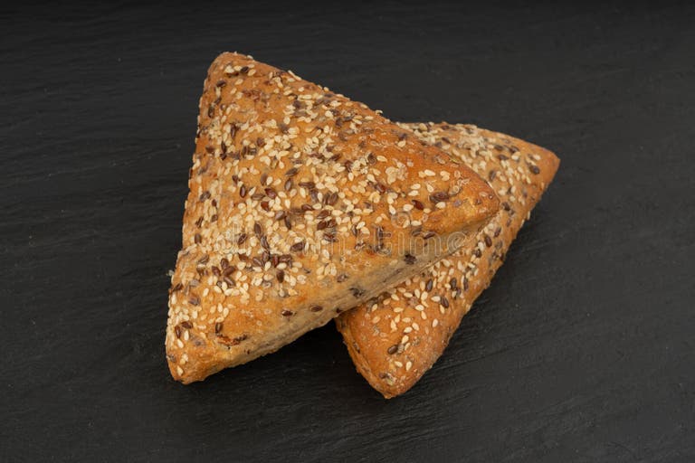 Triangular Bun Closeup. Wheat Bread with Sesame and Flax Seeds, Healthy ...