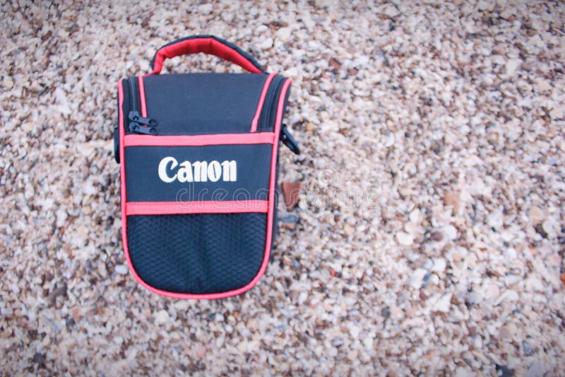 A Triangular Canon Camera Bag for the Camera Body and One Lens ...