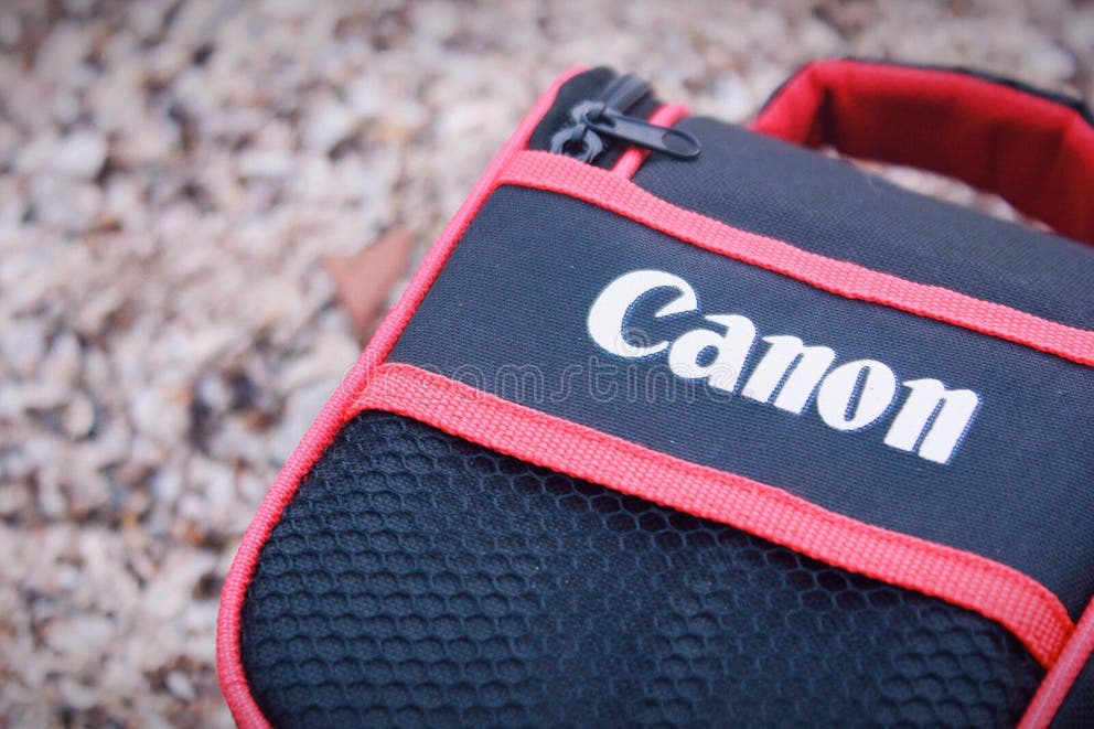 A Triangular Canon Camera Bag for the Camera Body and One Lens ...