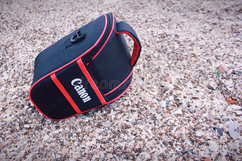 A Triangular Canon Camera Bag for the Camera Body and One Lens ...