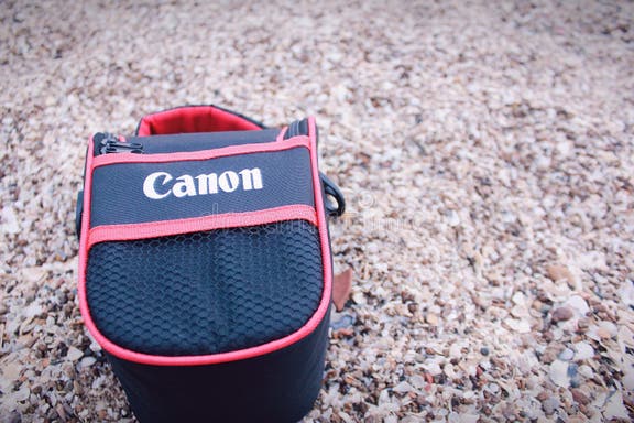A Triangular Canon Camera Bag for the Camera Body and One Lens ...