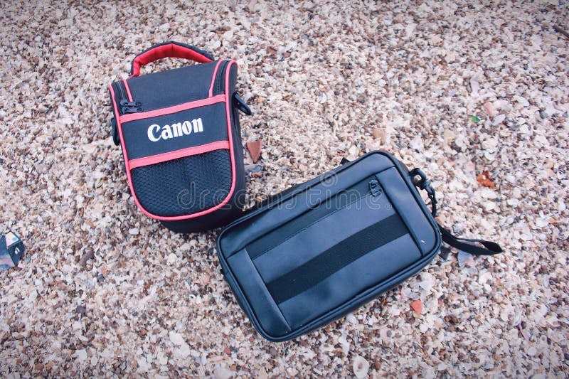 A Triangular Canon Camera Bag for the Camera Body and One Lens ...