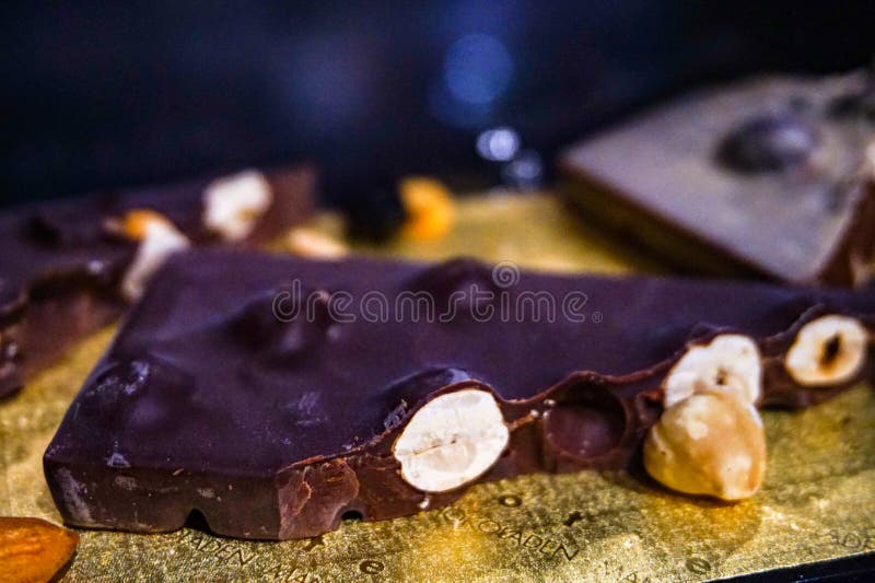 Triangular chocolate piece stock photo. Image of piece - 154872862
