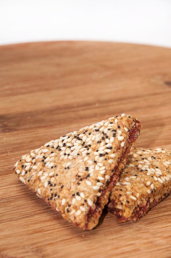 The Triangular Cookies with Cherries on a Kitchen Wooden Board Stock ...