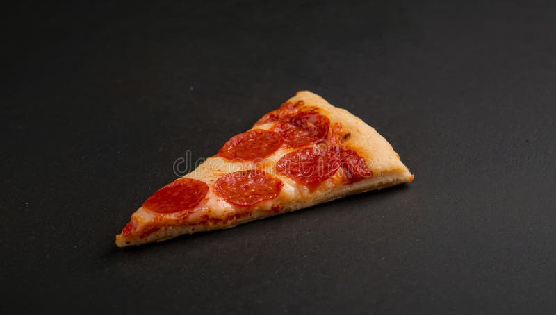 Triangular Cut. a Pepperoni Pizza Slice on Dark Texture, Casual ...