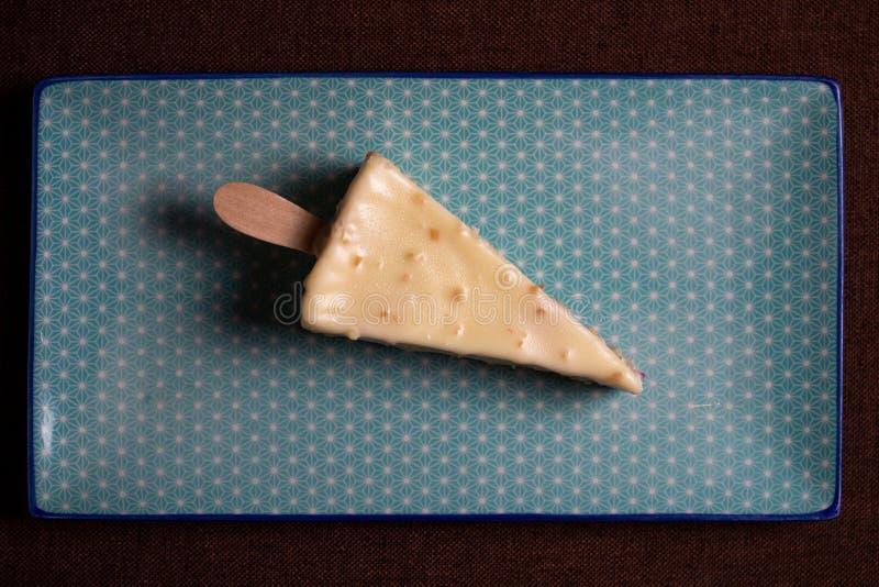 Top View Triangular Dessert on a Stick in White Chocolate Stock Photo ...